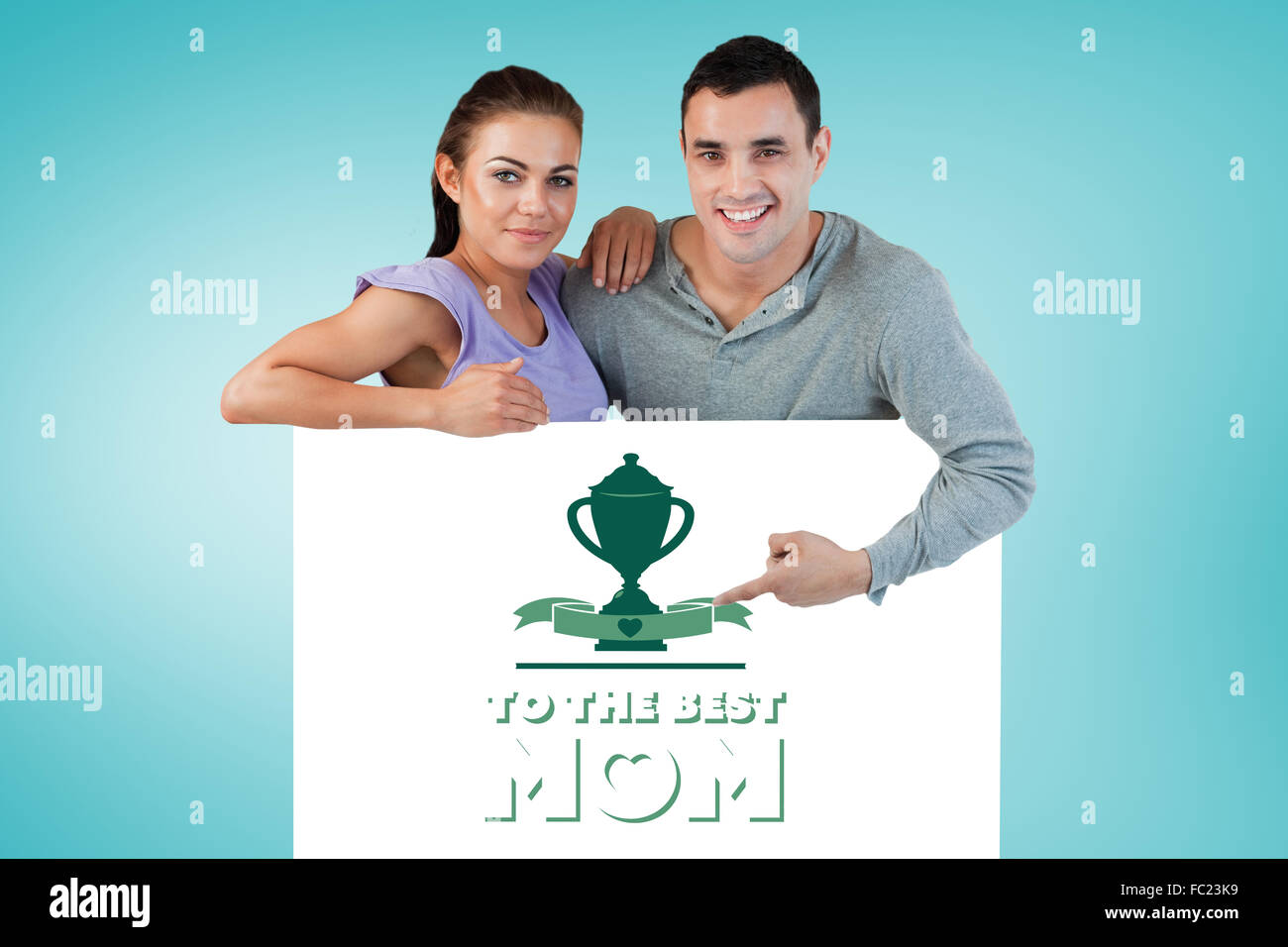 Composite image of young couple presenting advertisement Stock Photo ...