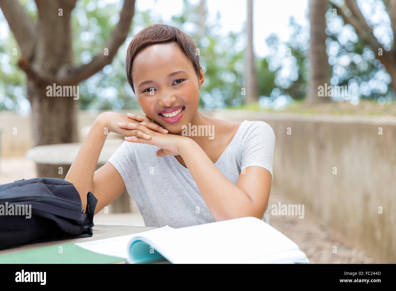 portrait of pretty African female college student on campus Stock Photo ...