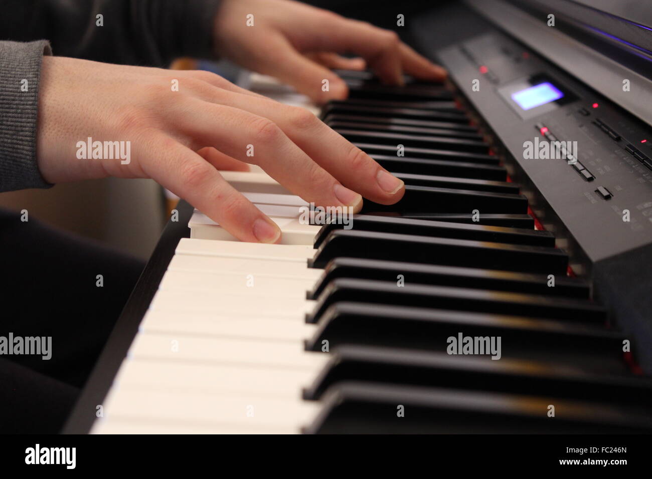 Hands playing classical piano hi-res stock photography and images - Alamy