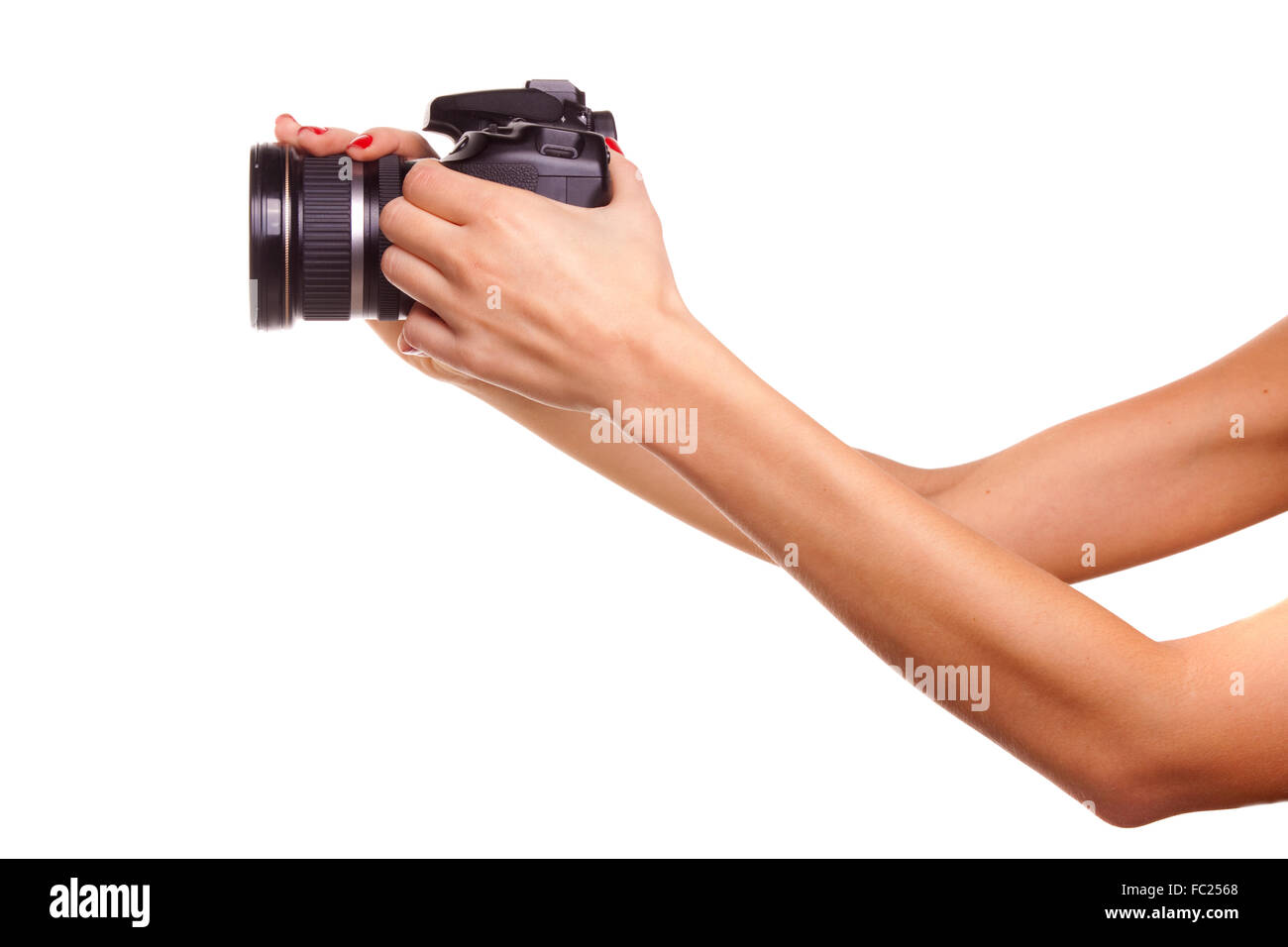 Women's hands holding the camera Stock Photo - Alamy