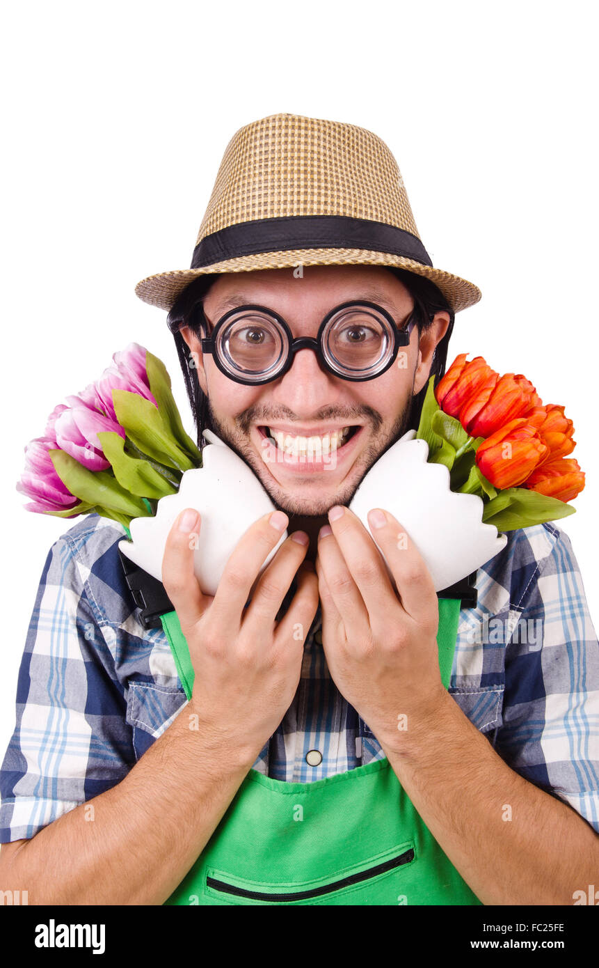 Young funny gardener with tulips isolated oin white Stock Photo - Alamy