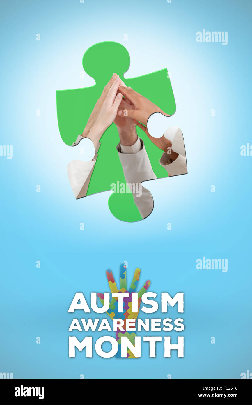 Composite image of business people showing teamwork spirit Stock Photo ...