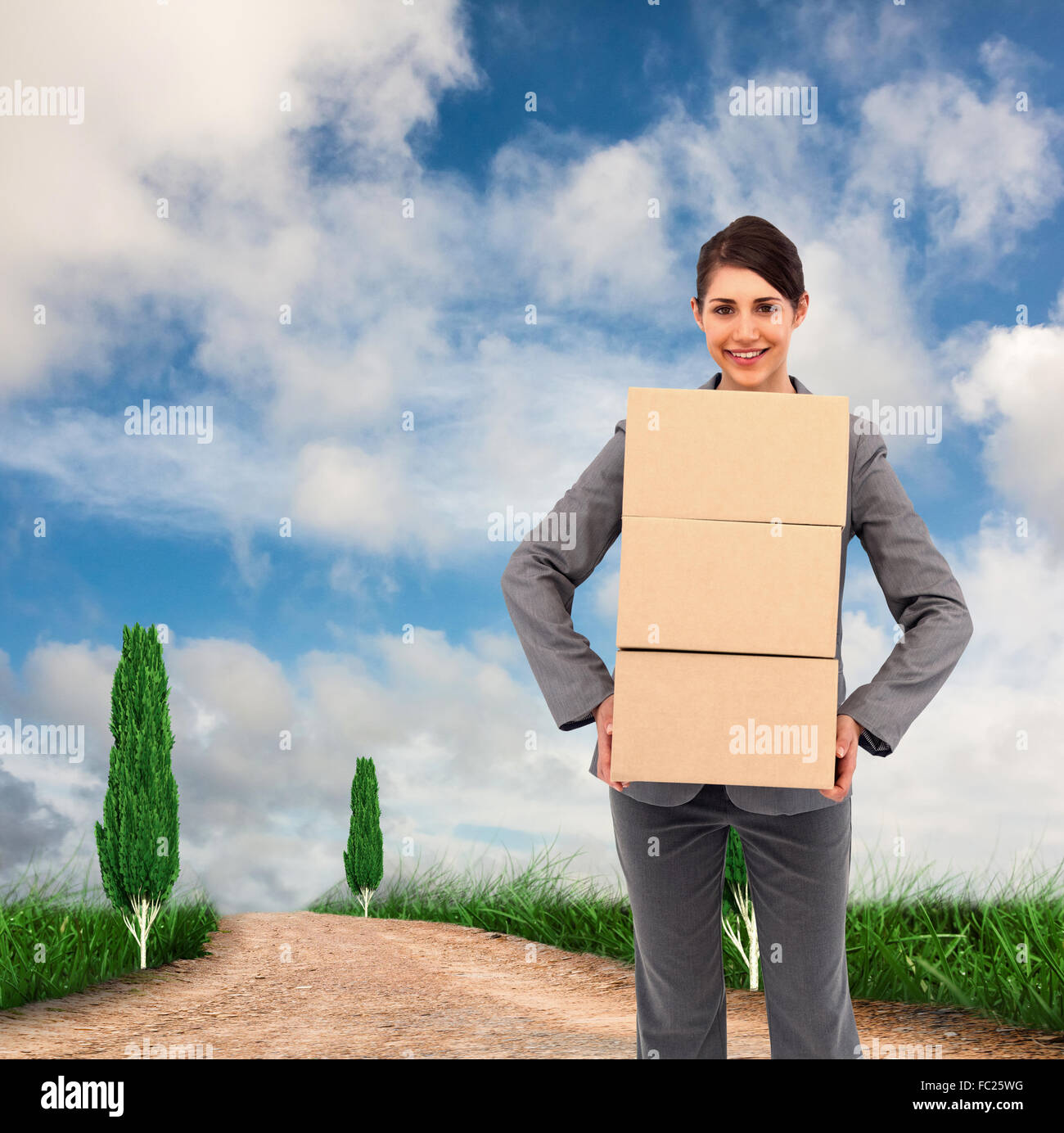 Composite image of smiling businesswoman carrying cardboard boxes Stock ...