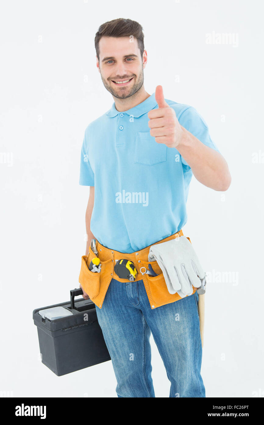 Portrait of happy carpenter gesturing thumbs up Stock Photo - Alamy
