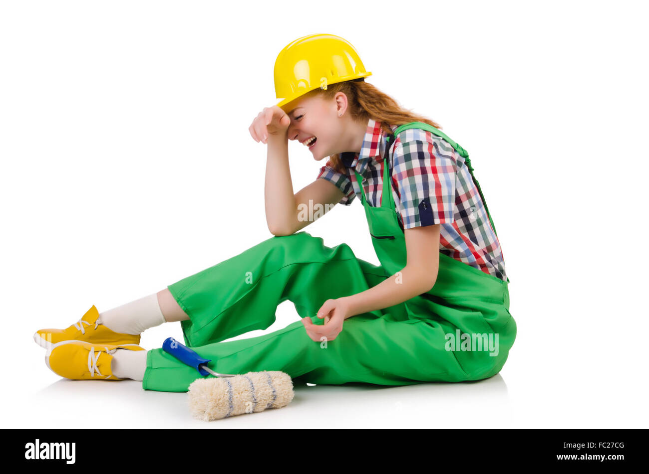 Female handyman in overalls isolated on white Stock Photo - Alamy