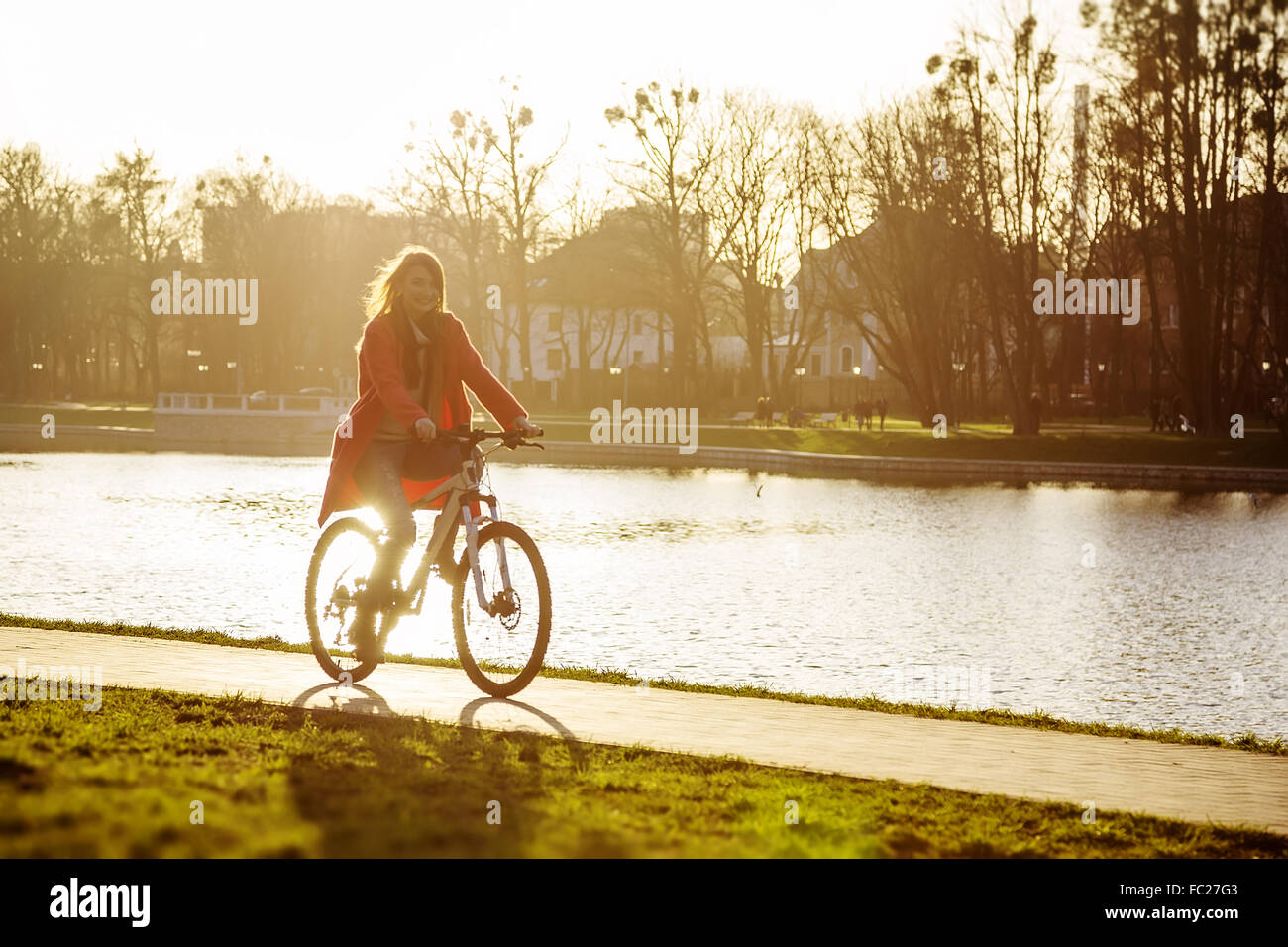 girl drives on bike Stock Photo - Alamy