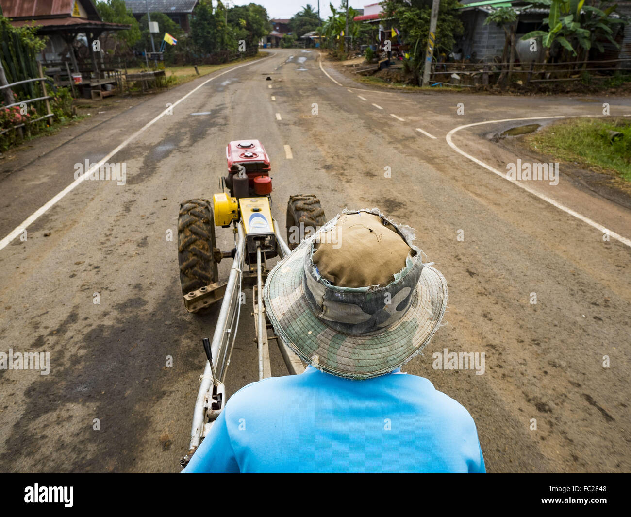 Si Liam, Buri Ram, Thailand. 20th Jan, 2016. A farmer drives his ...
