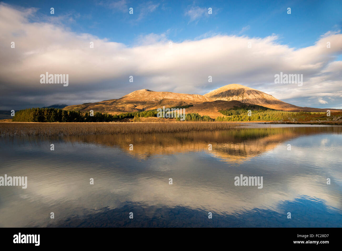 Calm reflections at Loch Cill Chriosd on the Isle of Skye, Scotland UK ...