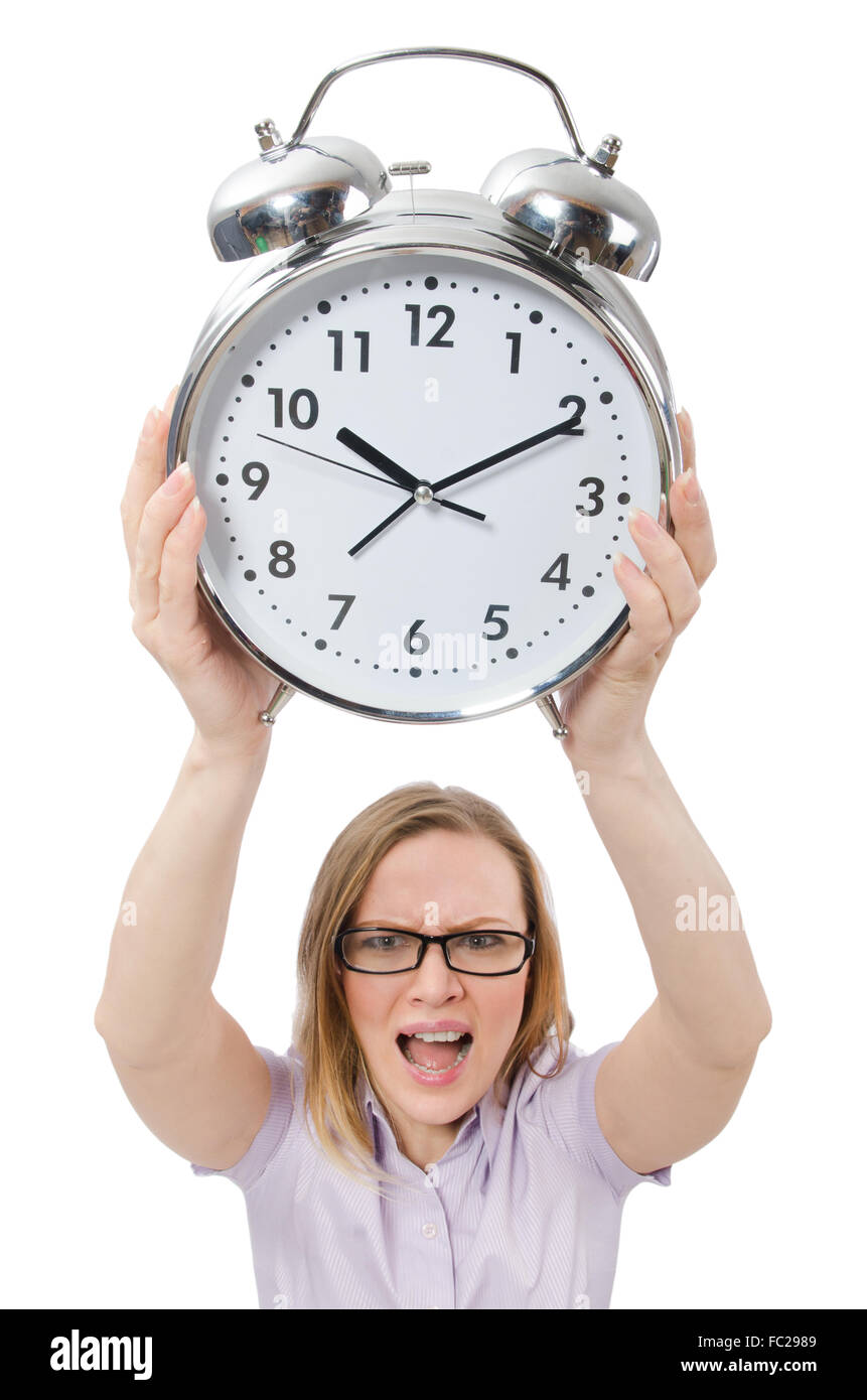 Young employee holding alarm clock isolated on white Stock Photo - Alamy