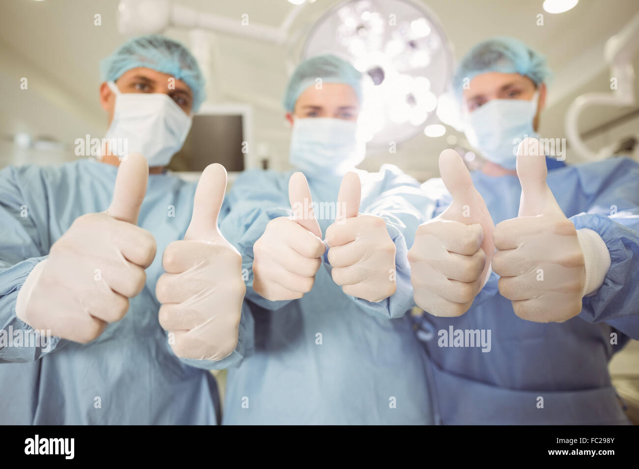 Portrait medical team showing thumbs up hi-res stock photography and ...