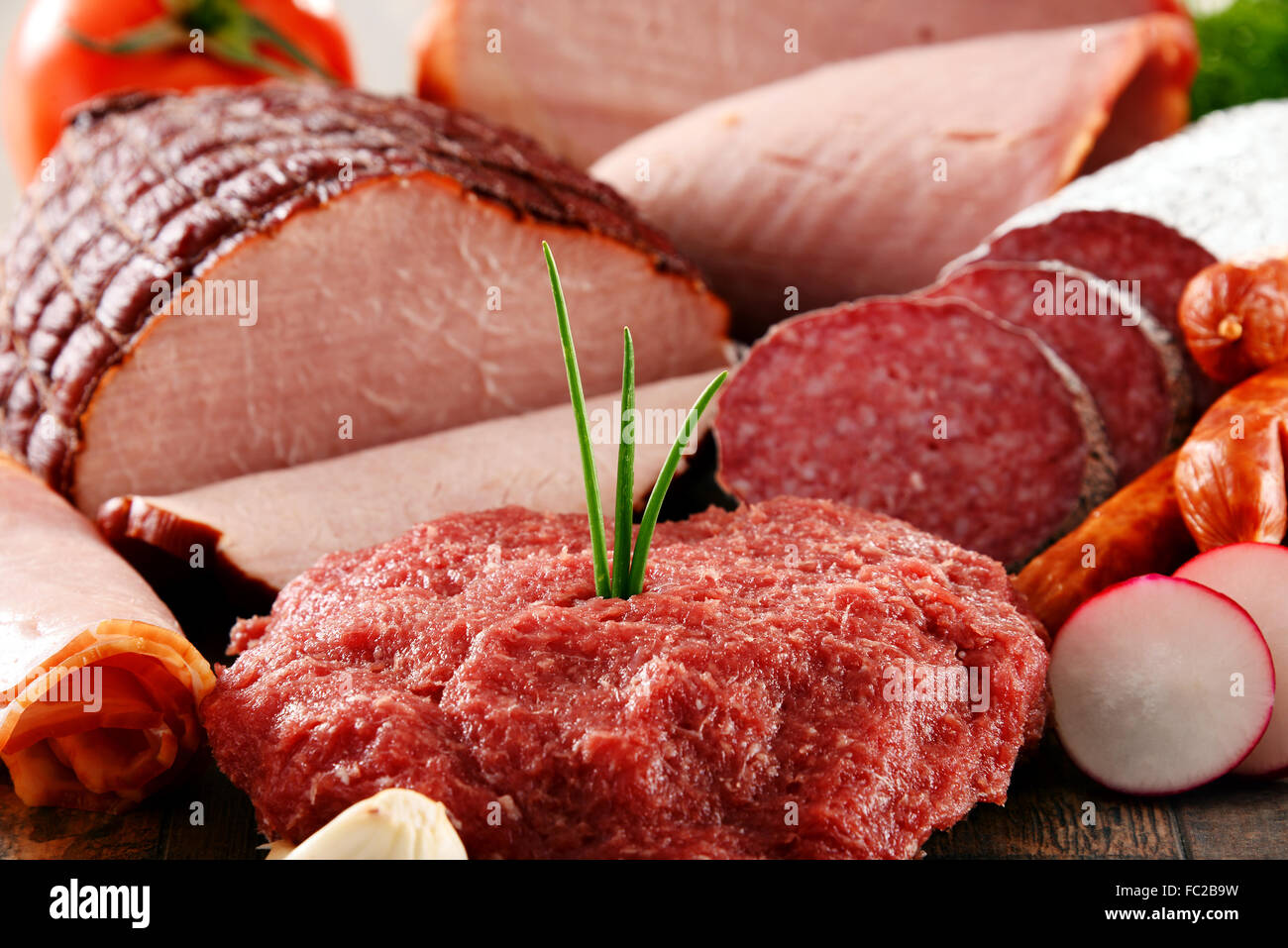 Assorted meat products including ham and sausages Stock Photo - Alamy