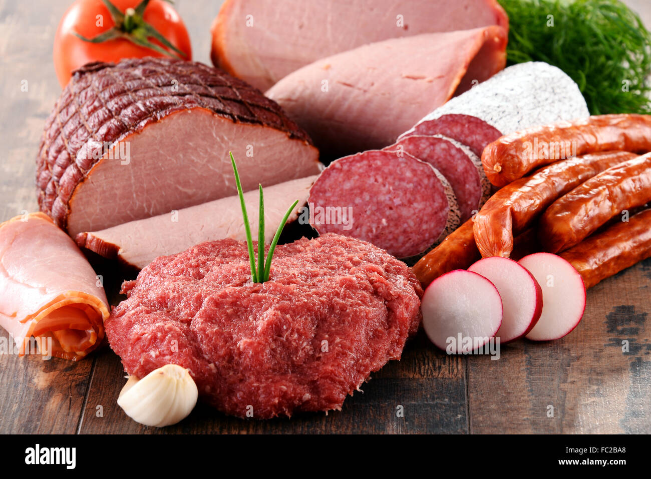 Assorted meat products including ham and sausages Stock Photo - Alamy
