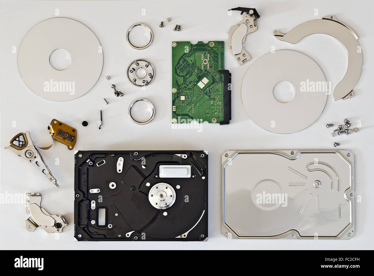 parts of a disassembled hard disc Stock Photo - Alamy