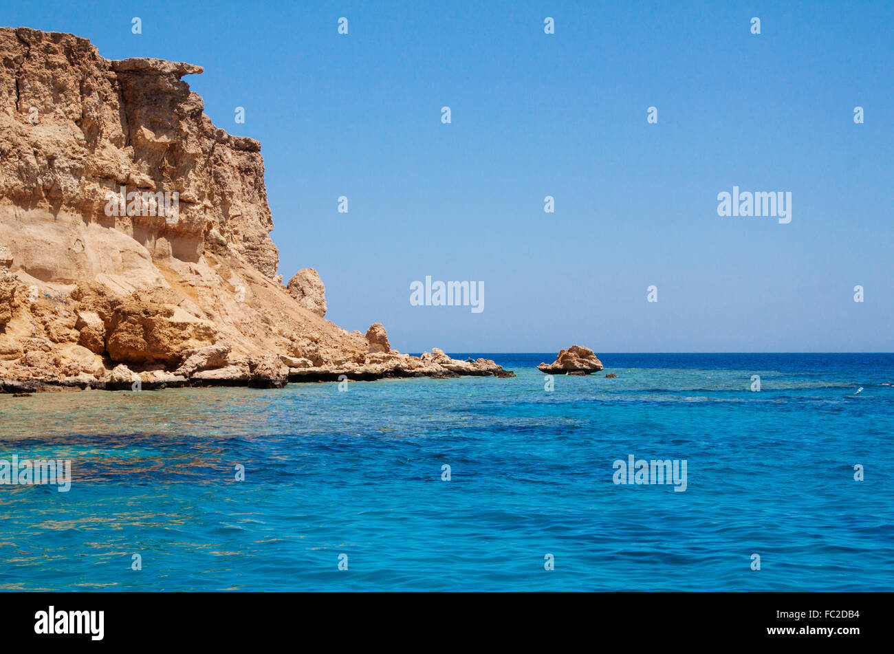 Blue water view with cliff for touristic design Stock Photo - Alamy
