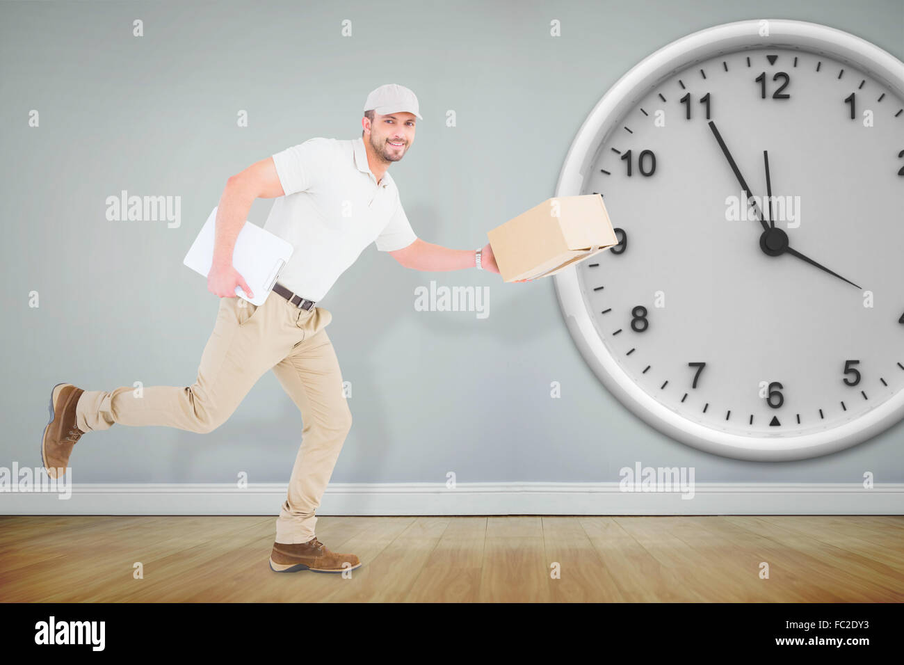 Composite image of delivery man with cardboard boxes running Stock ...