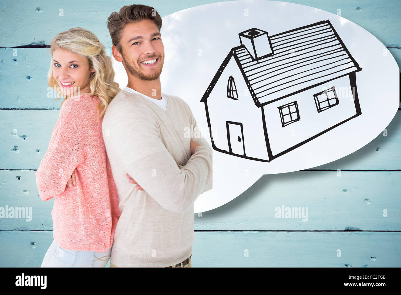 Composite image of attractive couple smiling with arms crossed Stock ...