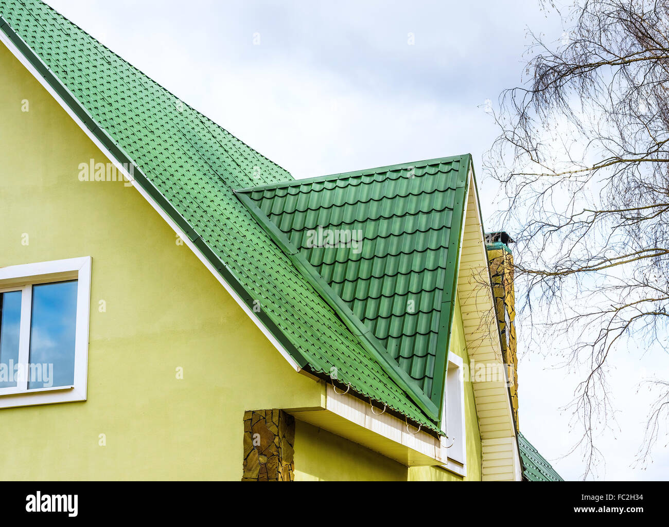 house with a gable roof window Stock Photo - Alamy