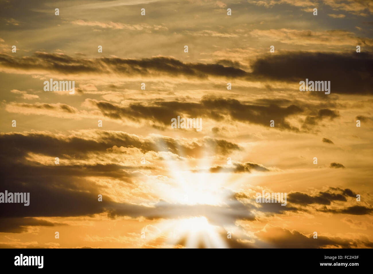 Sunset in clouds Stock Photo - Alamy