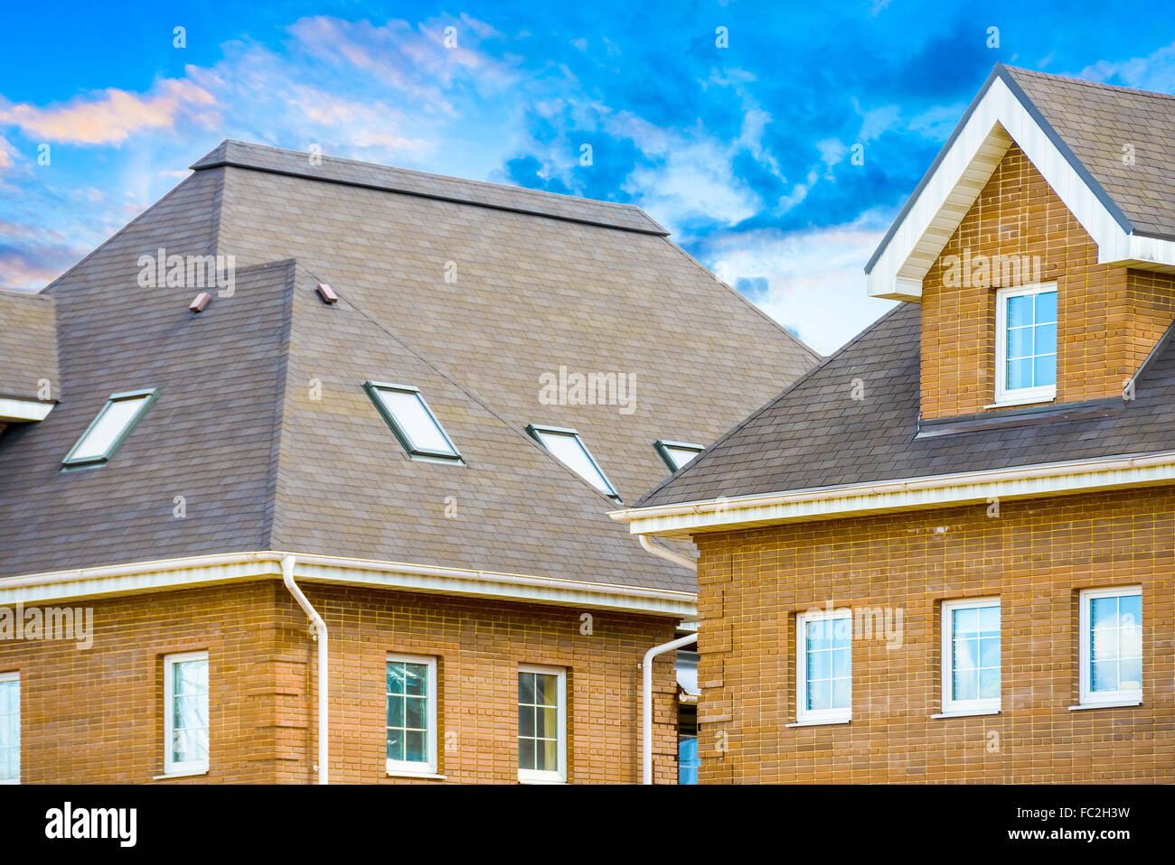 house with a gable roof window Stock Photo - Alamy