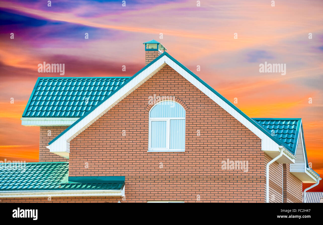 house with a gable roof window Stock Photo - Alamy