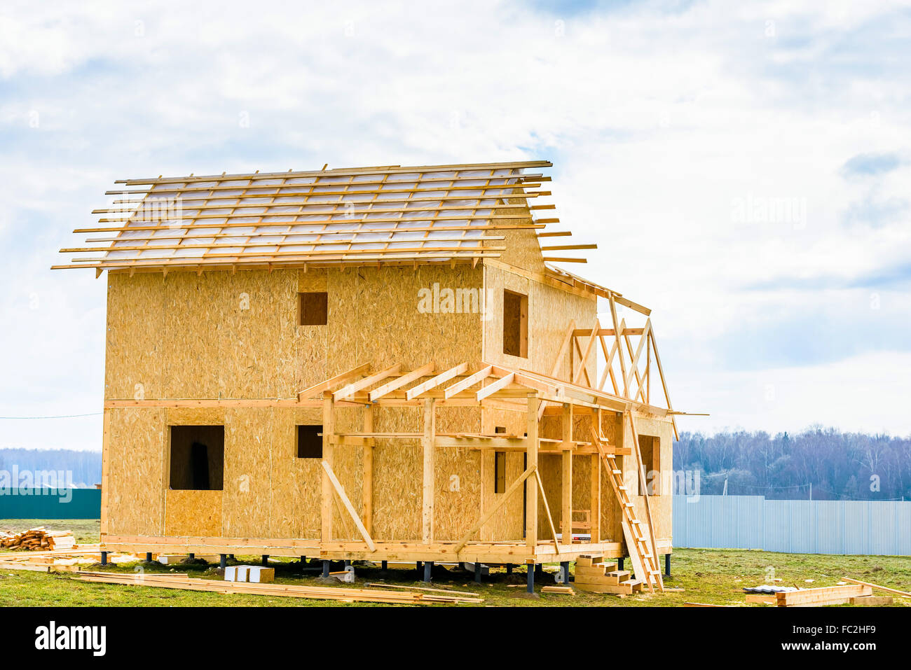 construction of a wooden house Stock Photo - Alamy