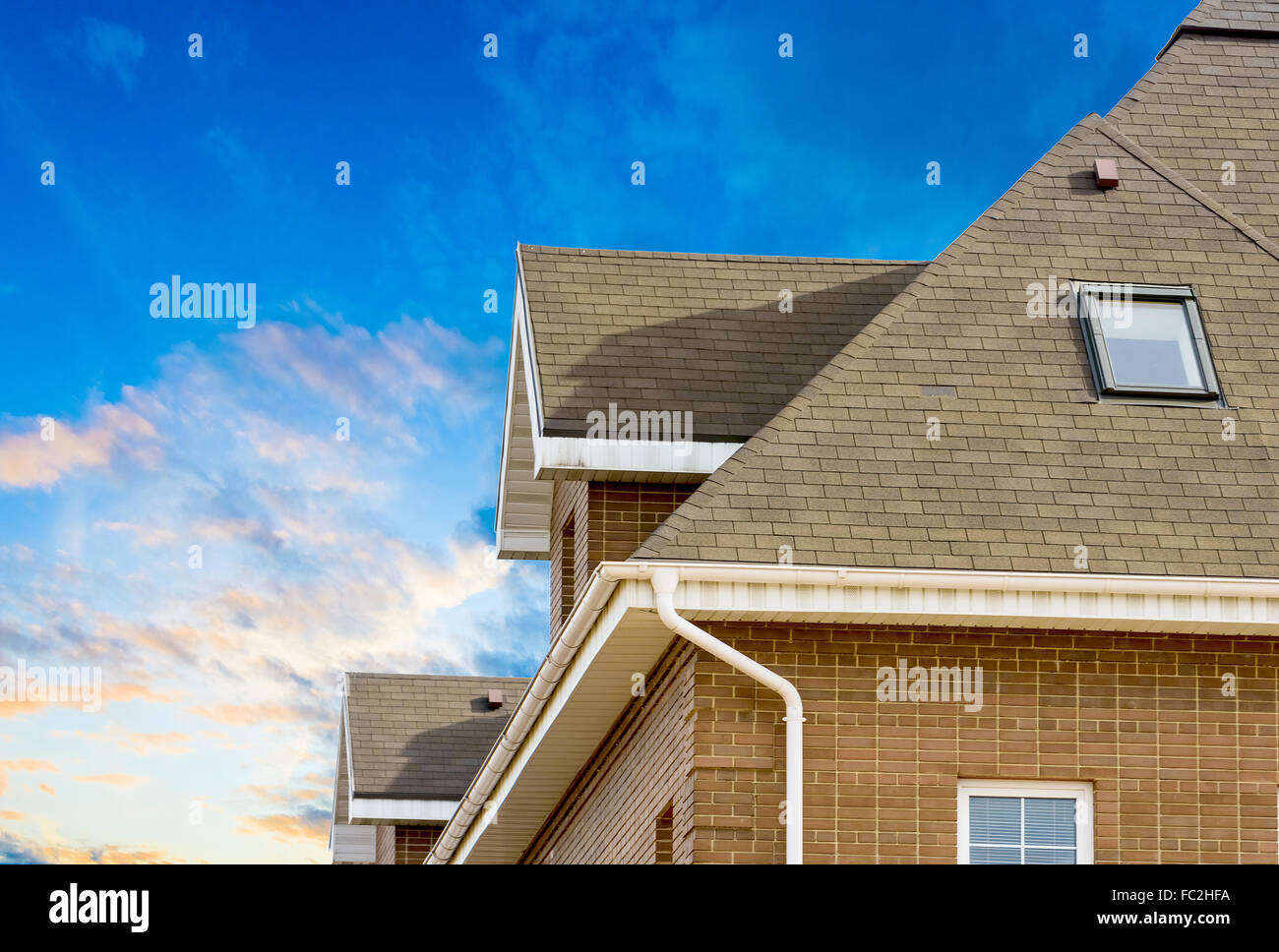 house with a gable roof window Stock Photo - Alamy