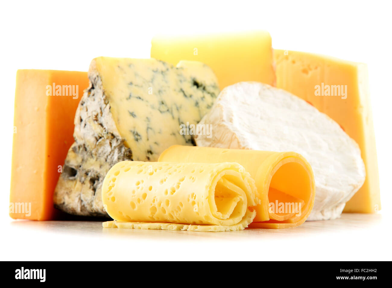 Different sorts of cheese isolated on white background Stock Photo - Alamy