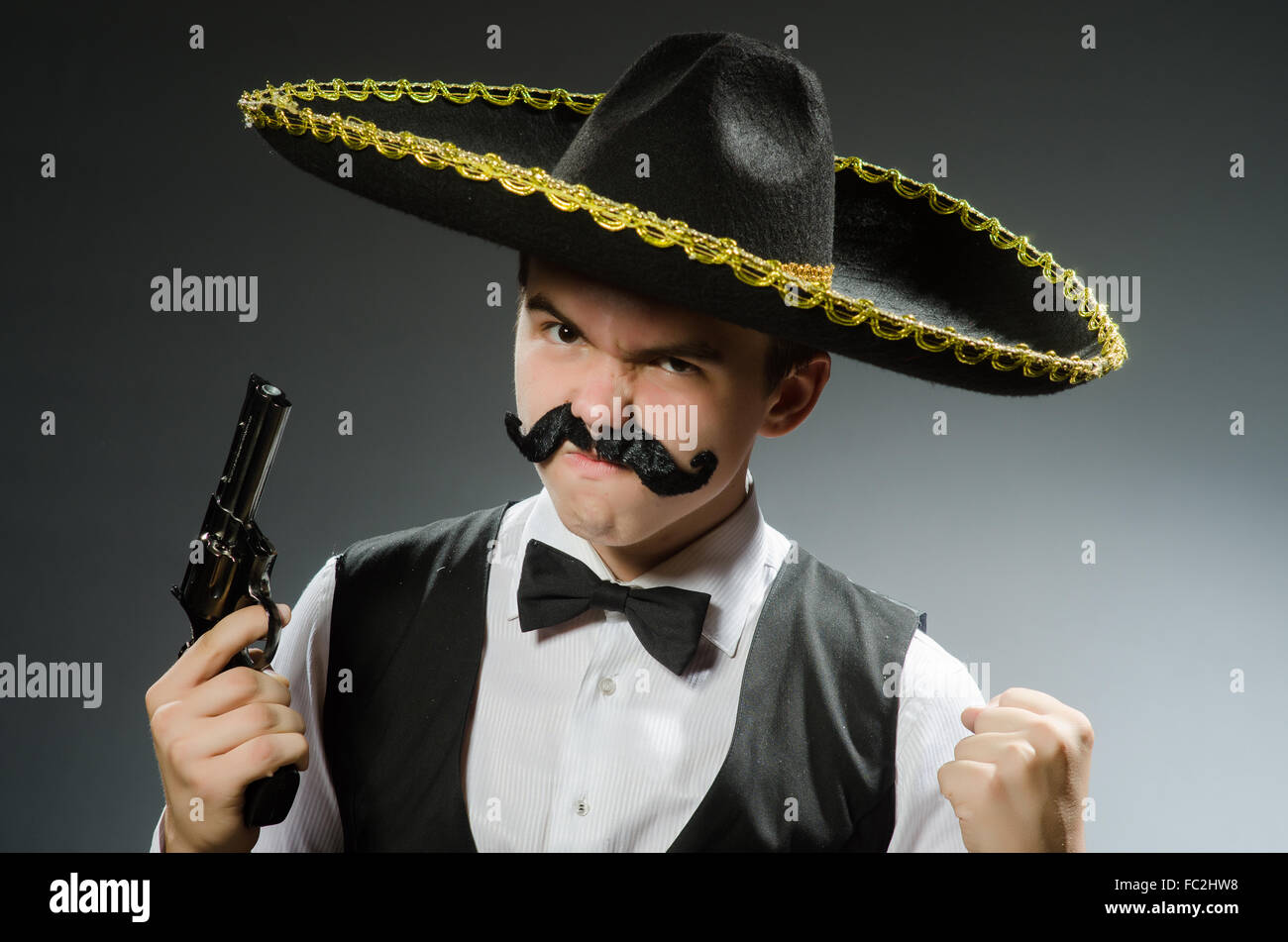 Smiling mexican with sombrero isolated on white Stock Photo - Alamy