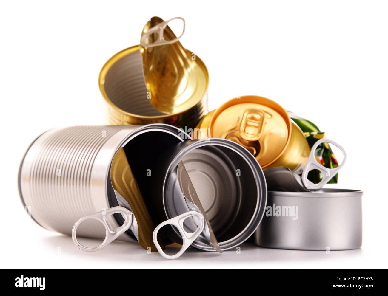 Recyclable garbage consisting of metal cans isolated on white ...