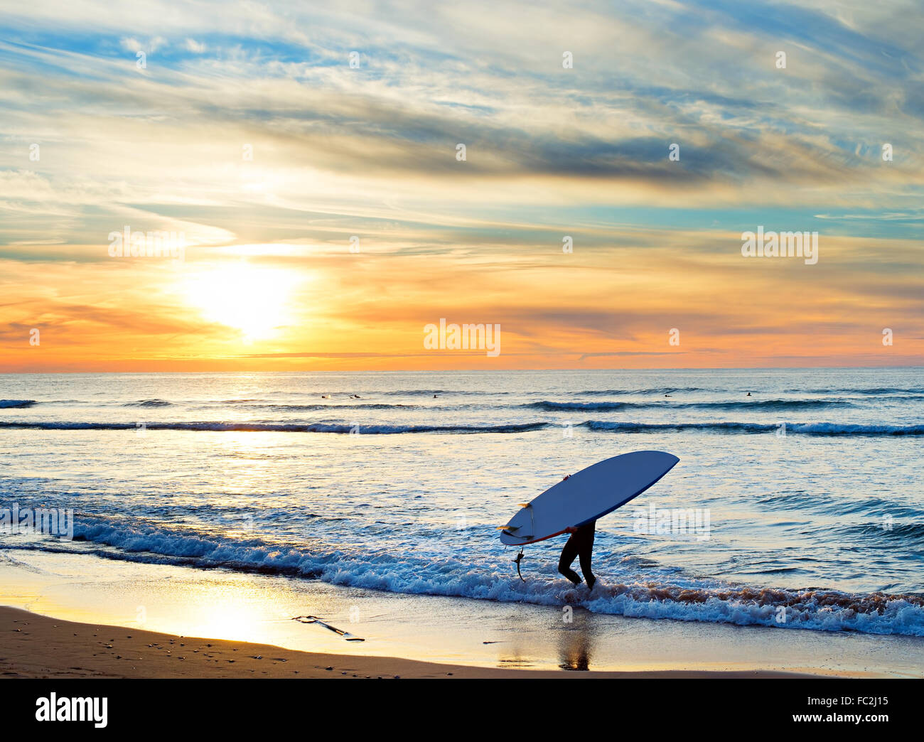 Paddle surfing, Portugal Stock Photo - Alamy