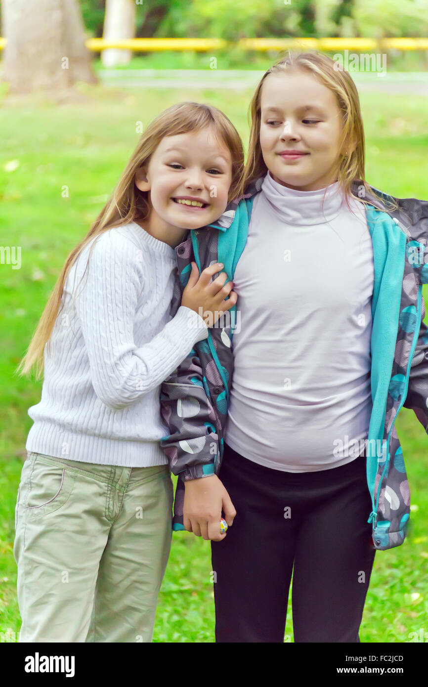 Cute two playing girls Stock Photo - Alamy