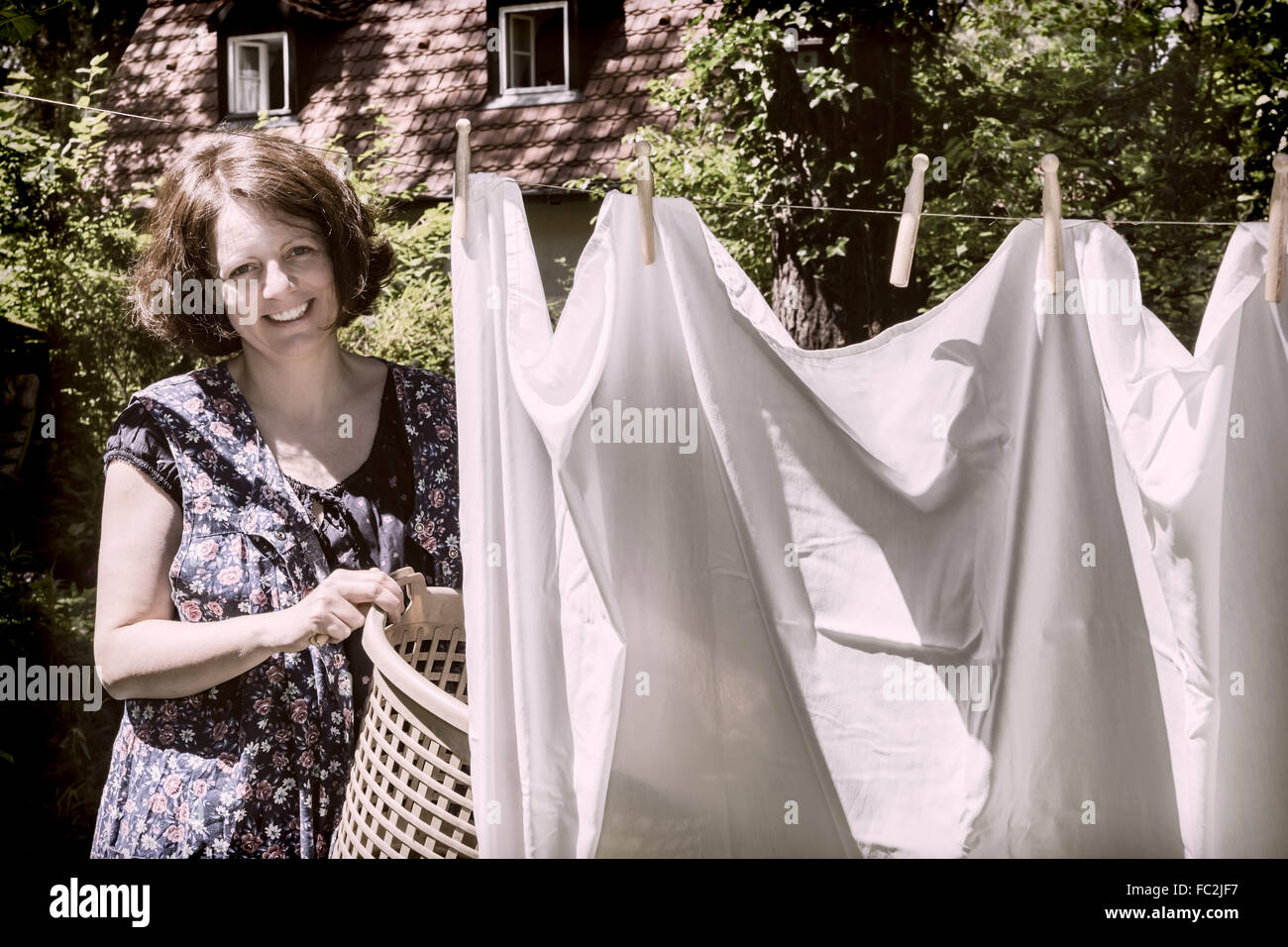 Hanging up the washing Stock Photo - Alamy