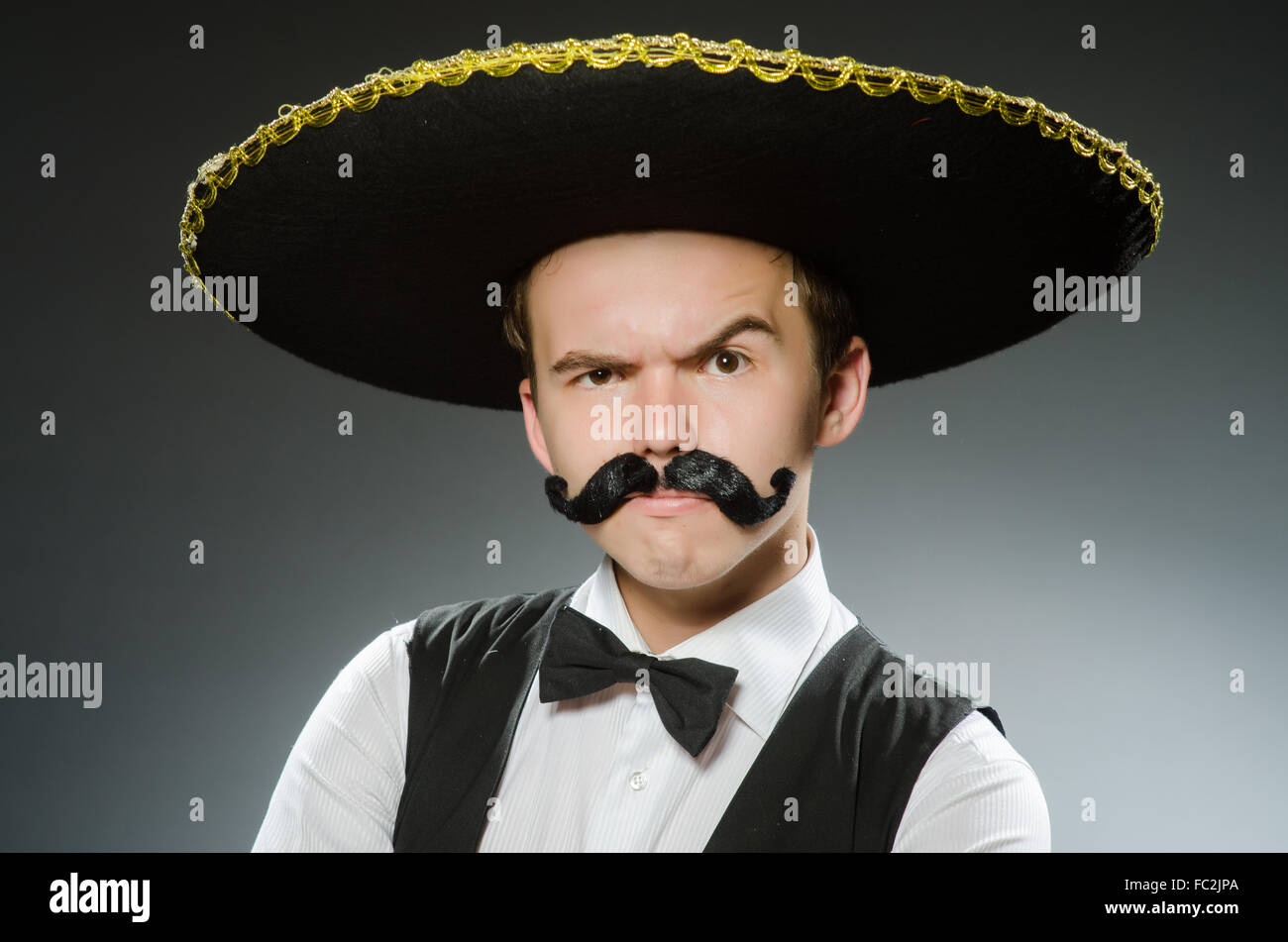 Smiling mexican with sombrero isolated on white Stock Photo - Alamy