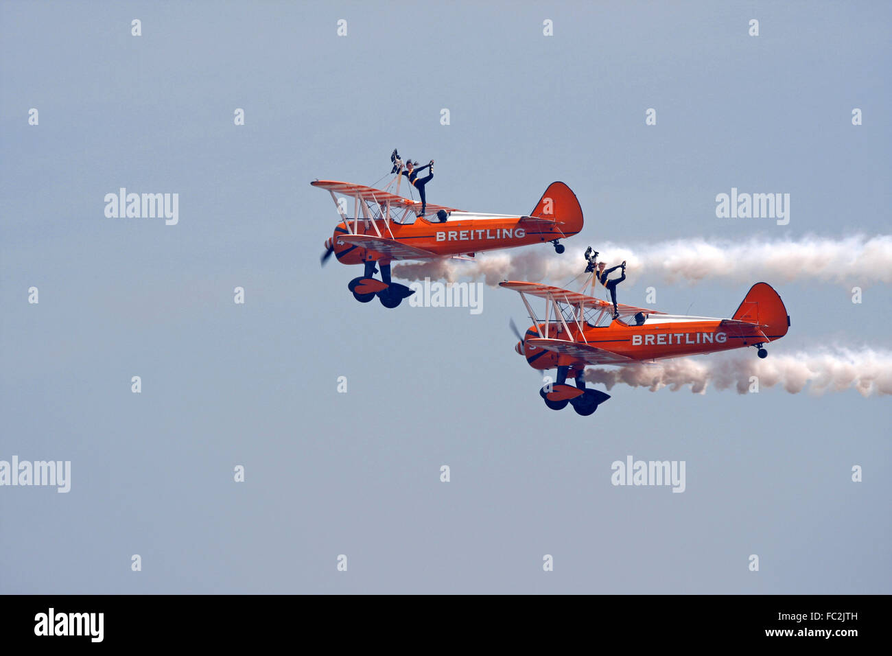 Biplane Wing walkers display Stock Photo - Alamy