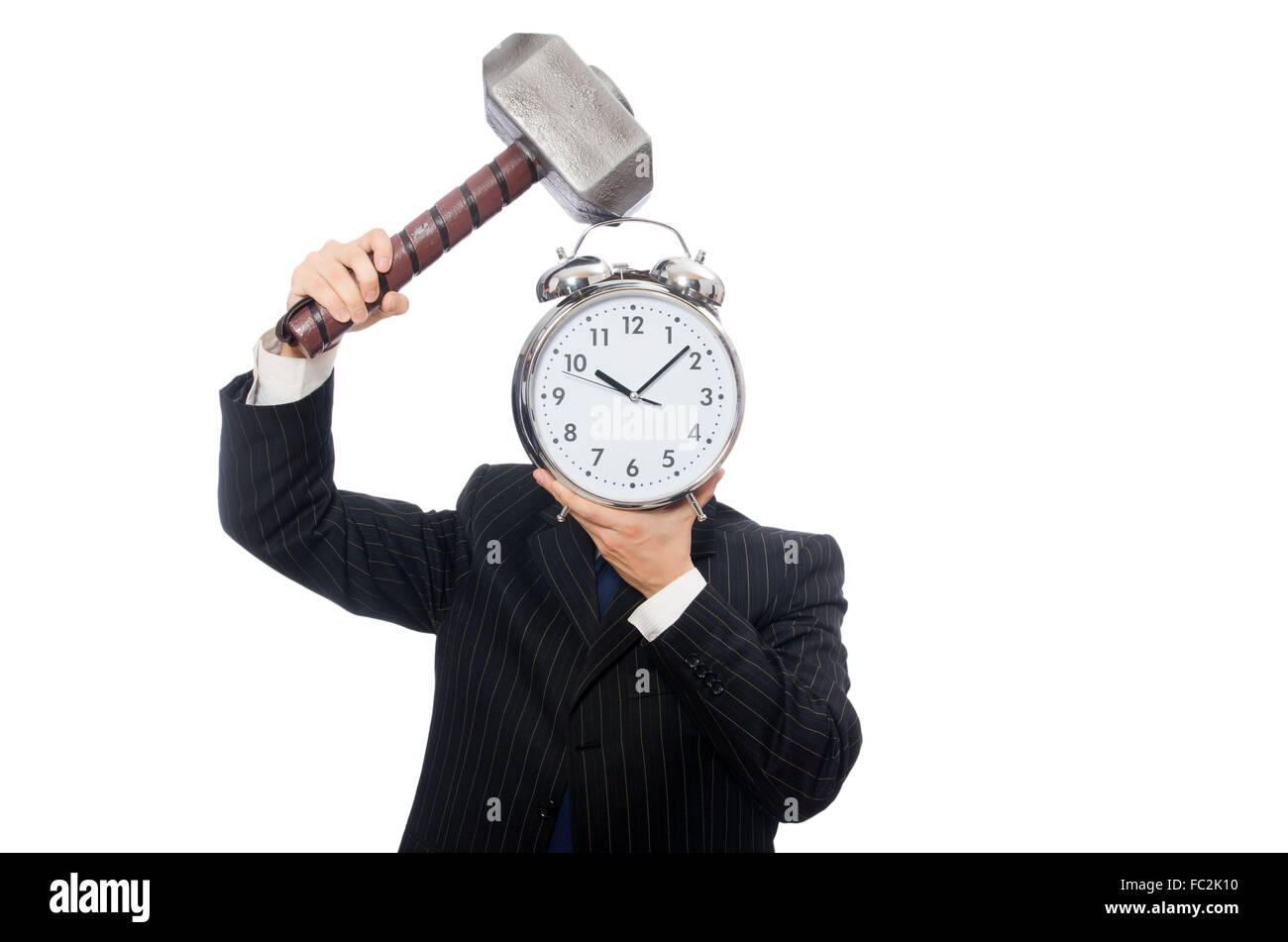 Businessman holding hammer and alarm clock isolated on white Stock ...