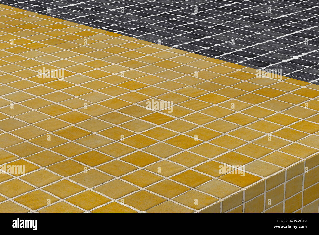 3d rendering of a close-up of yellow and black checked glazed tile ...