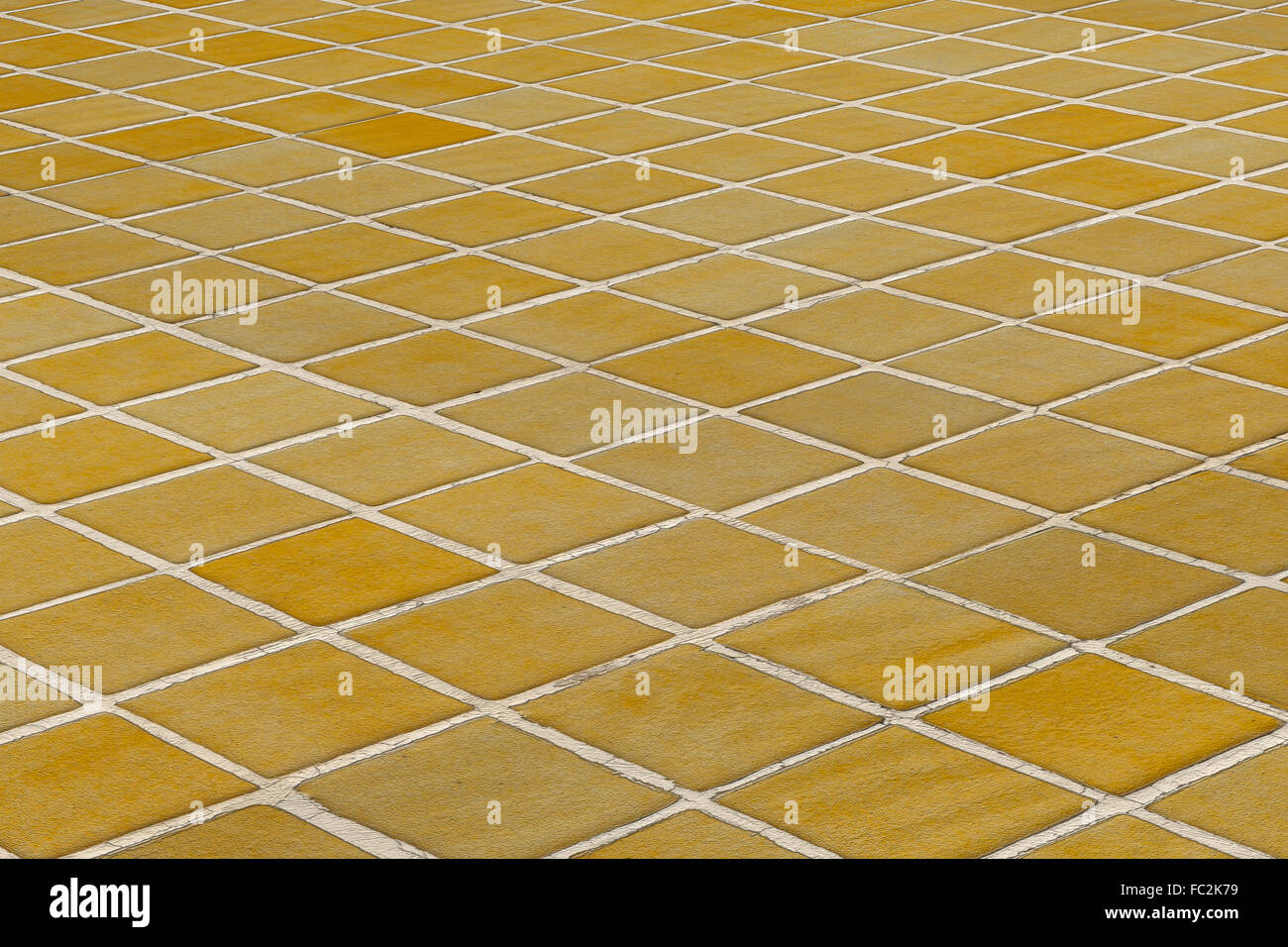 3d rendering of a close-up of yellow checked glazed tile floor/wall ...