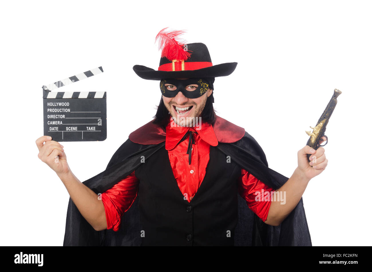Young man in carnival coat with gun and clapper isolated on whit Stock ...