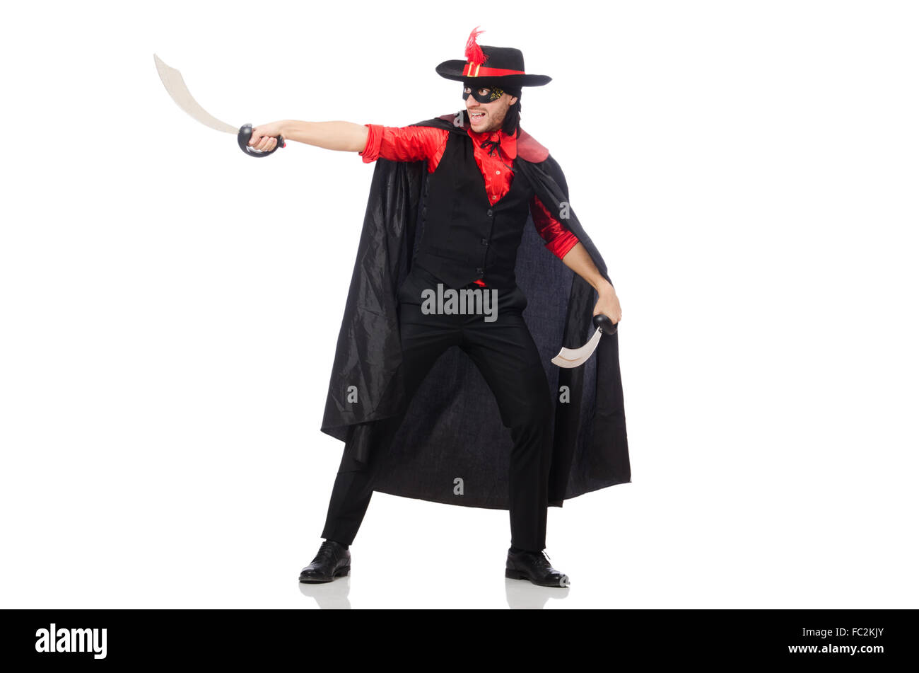 Young man in carnival coat with sword isolated on white Stock Photo - Alamy