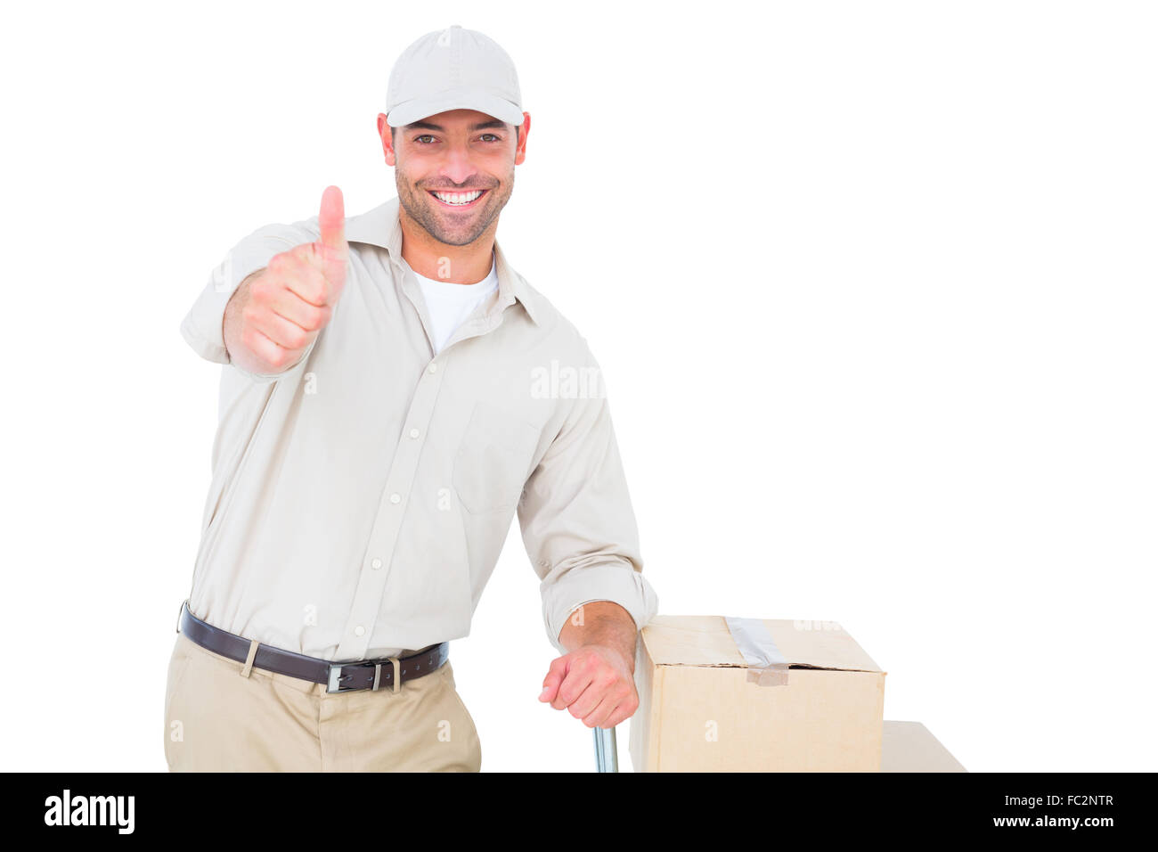 Delivery man gesturing thumbs up on white background Stock Photo - Alamy