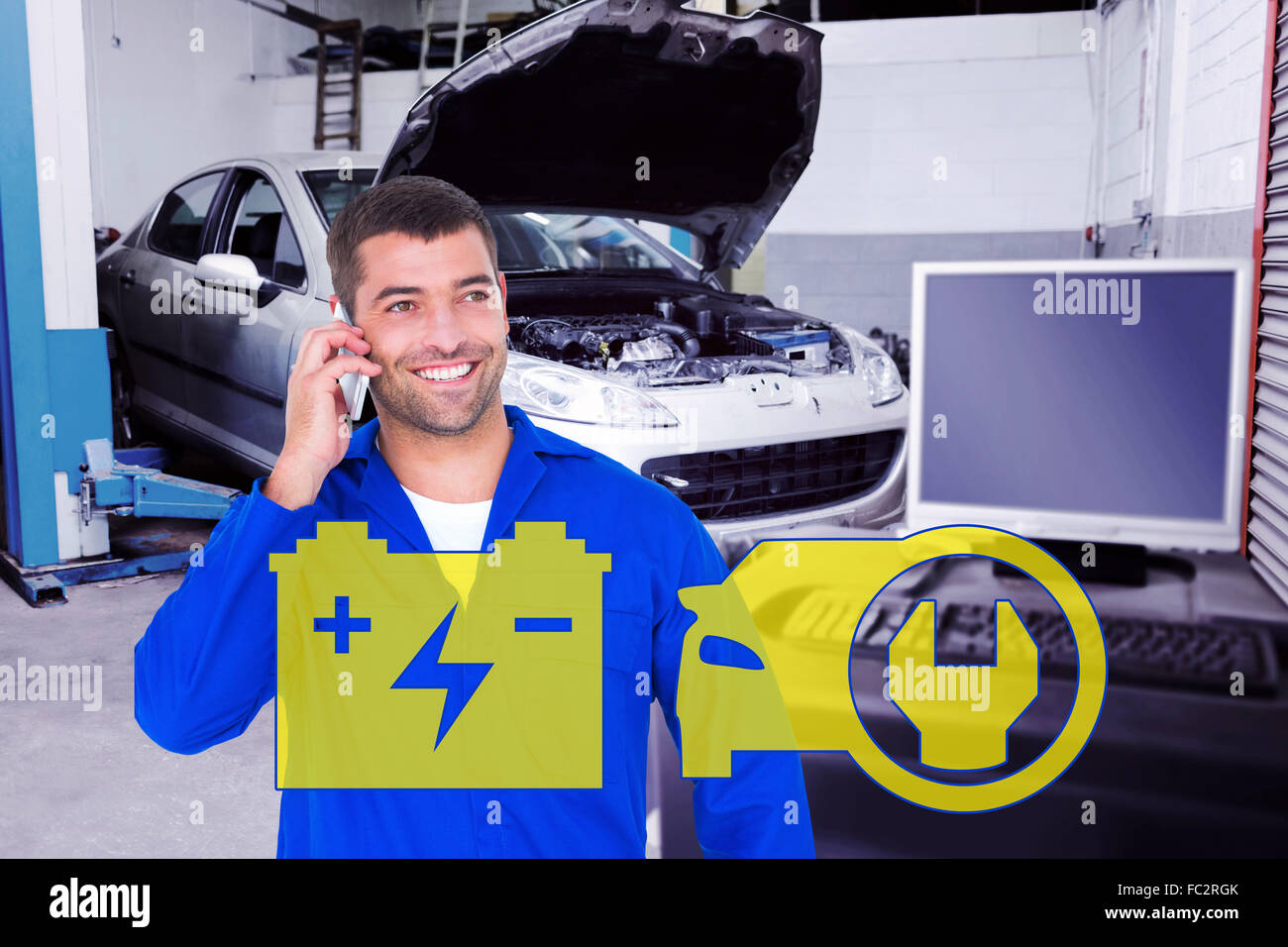 Composite image of smiling male mechanic using mobile phone Stock Photo ...