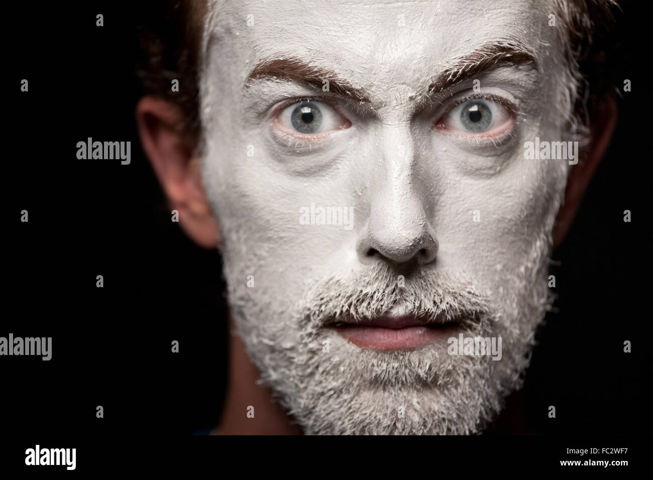 A man with makeup on his face Stock Photo - Alamy