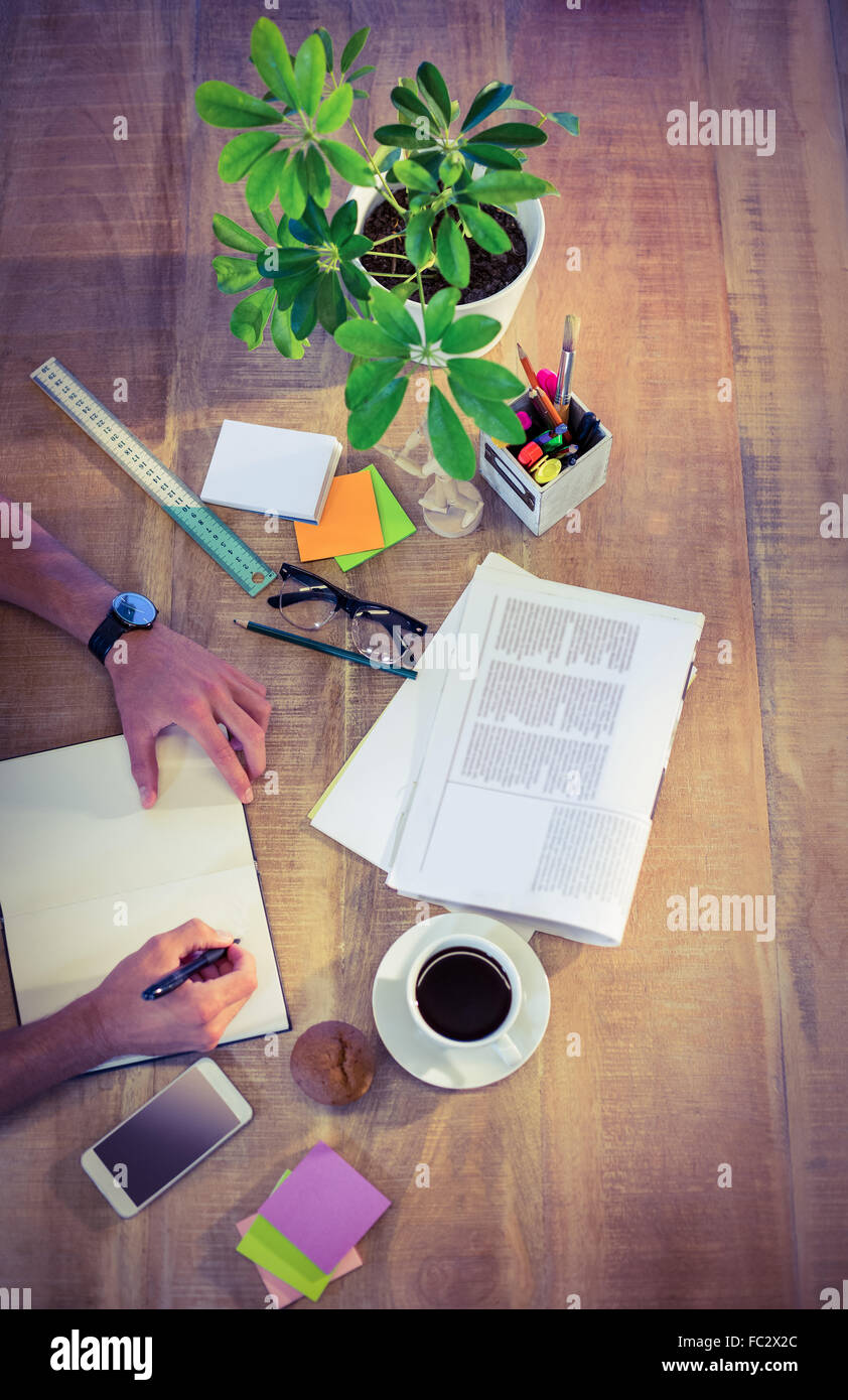 Designer working at desk overhead shot Stock Photo - Alamy