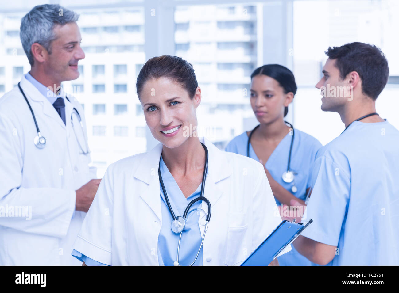 Portrait of a smiling confident female doctor Stock Photo - Alamy Portrait of a smiling confident female doctor Stock Photo - Alamy