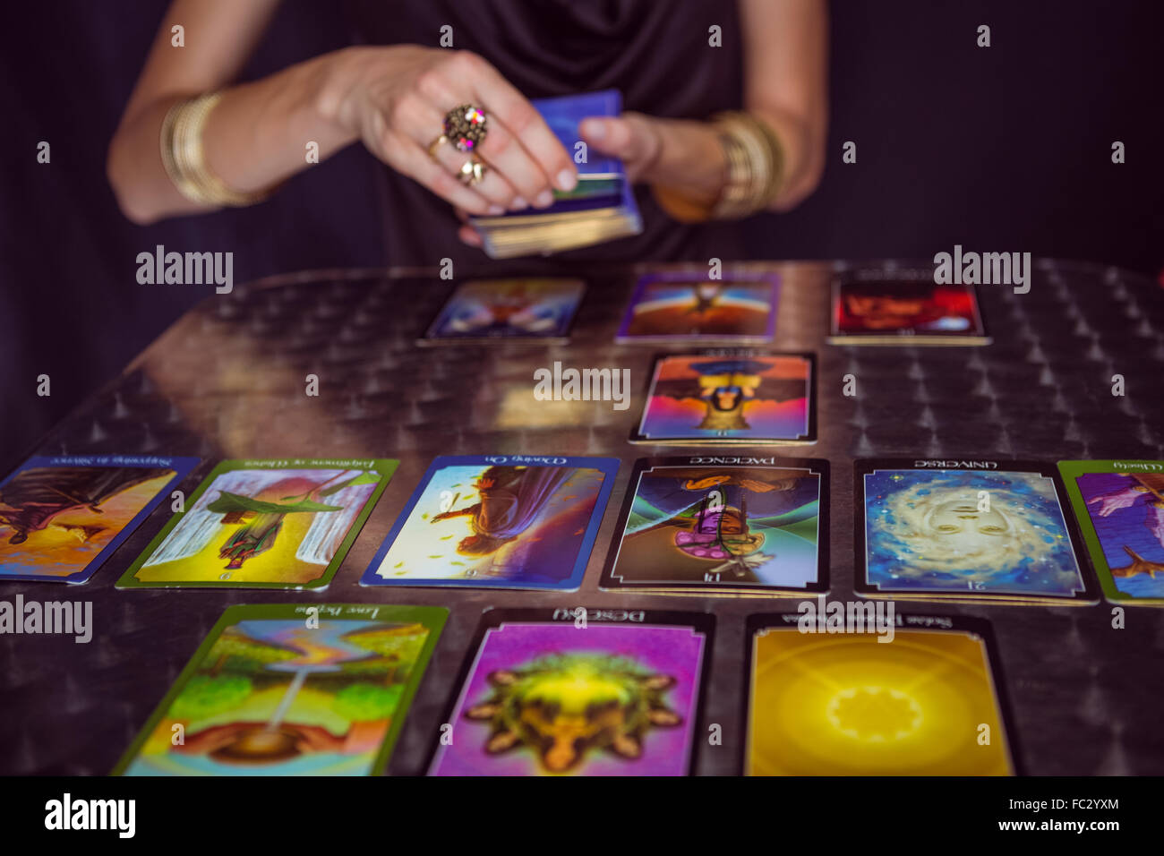 Fortune teller forecasting the future with tarot cards Stock Photo - Alamy