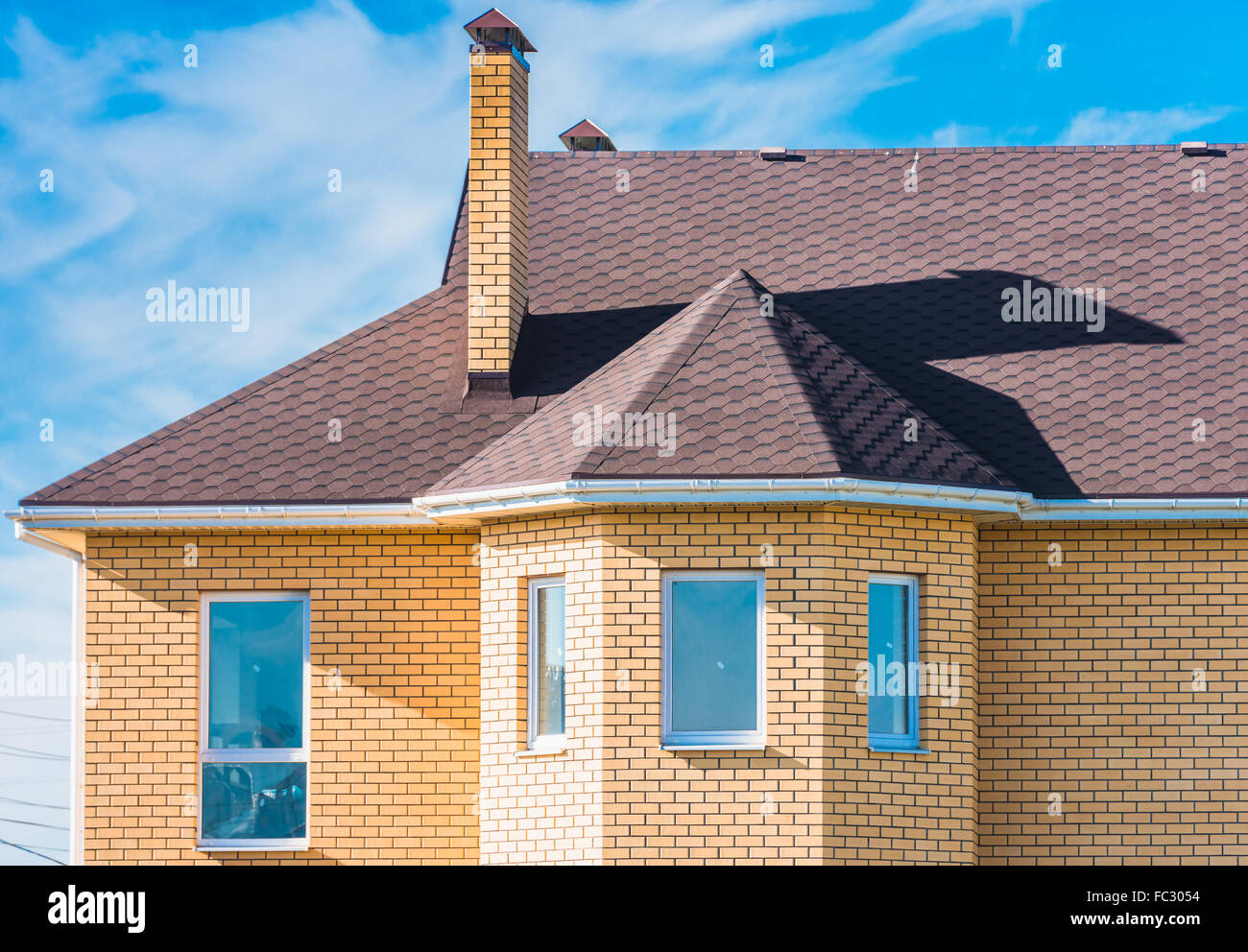 house with a gable roof window Stock Photo - Alamy