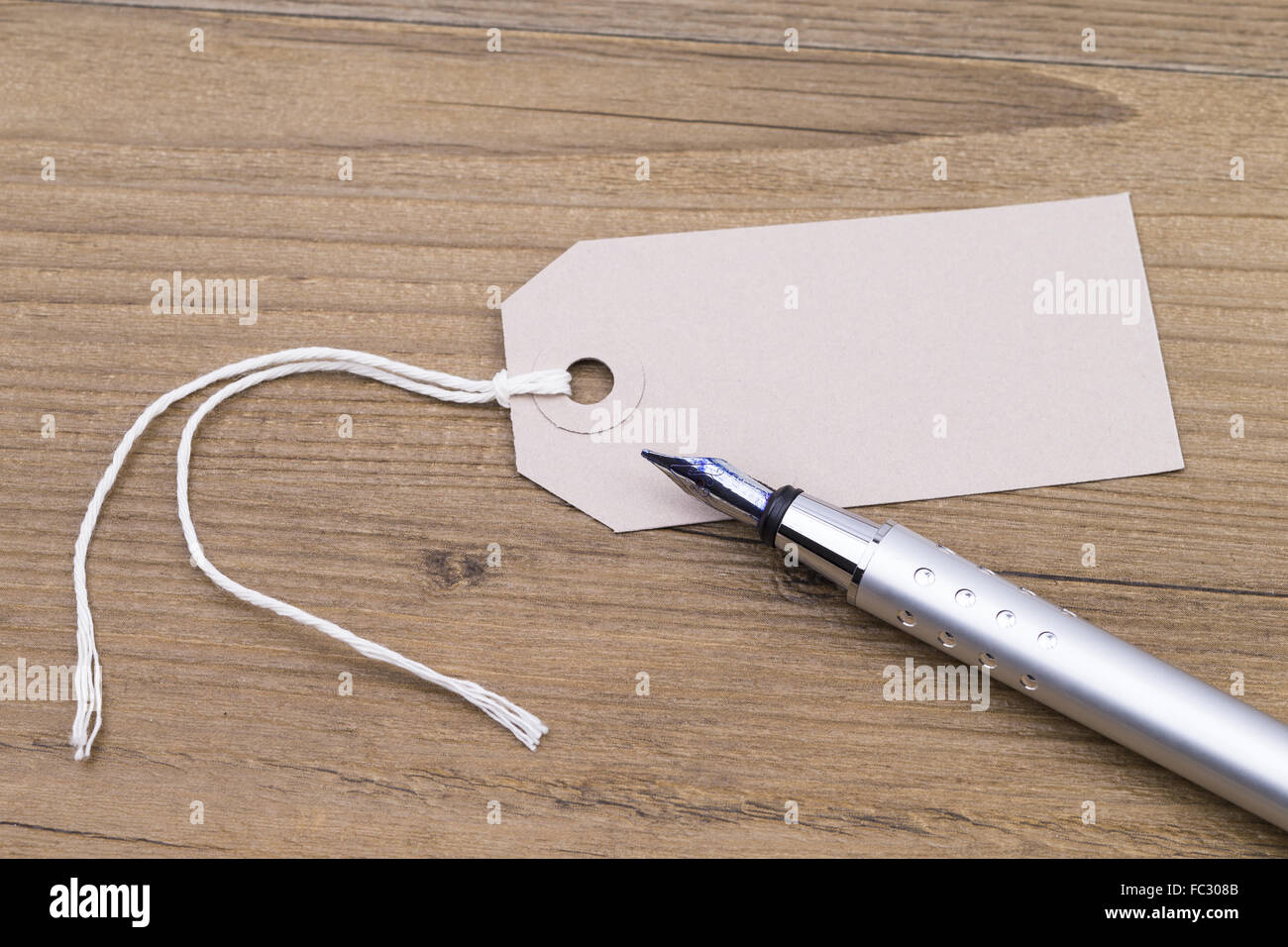 Label and pen Stock Photo - Alamy