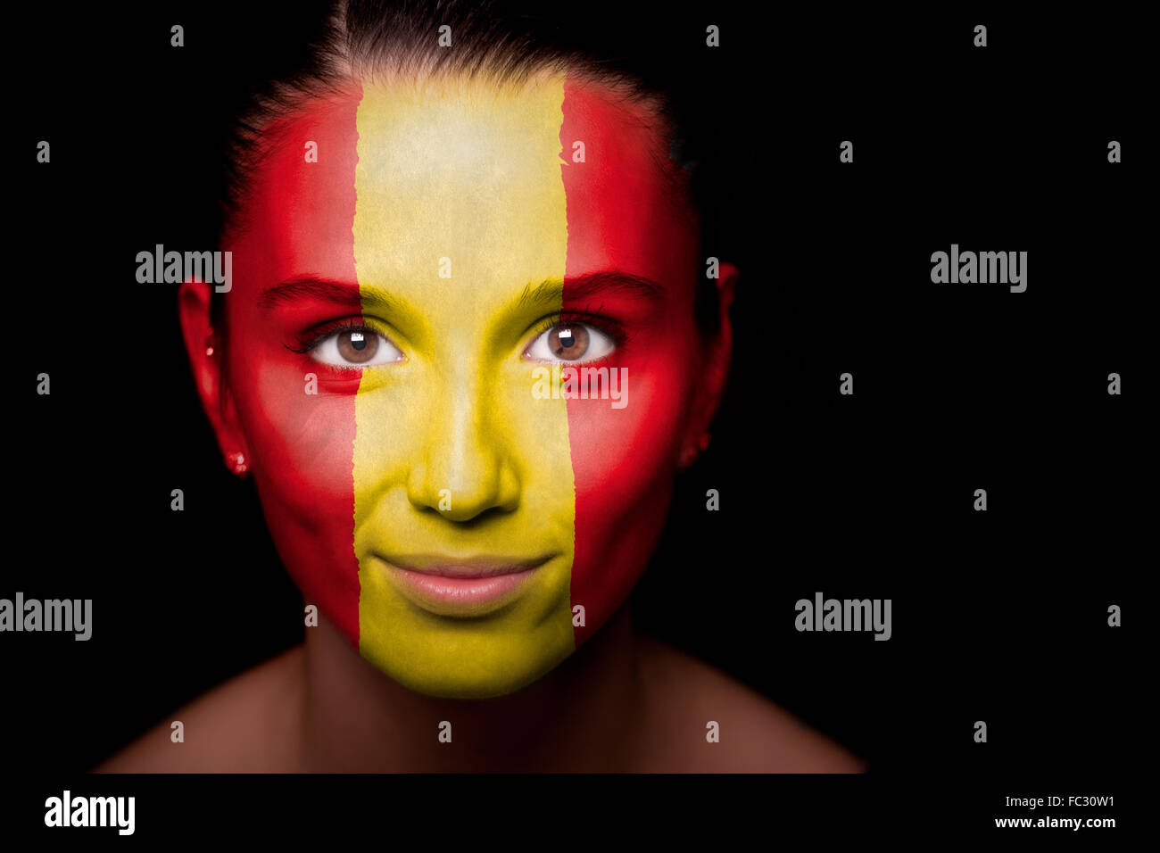 Human face painted with flag spanish hi-res stock photography and ...