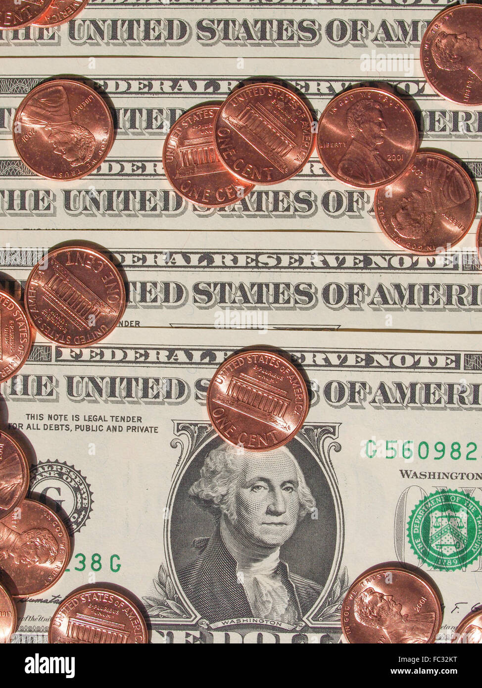 Dollar coins and notes Stock Photo - Alamy