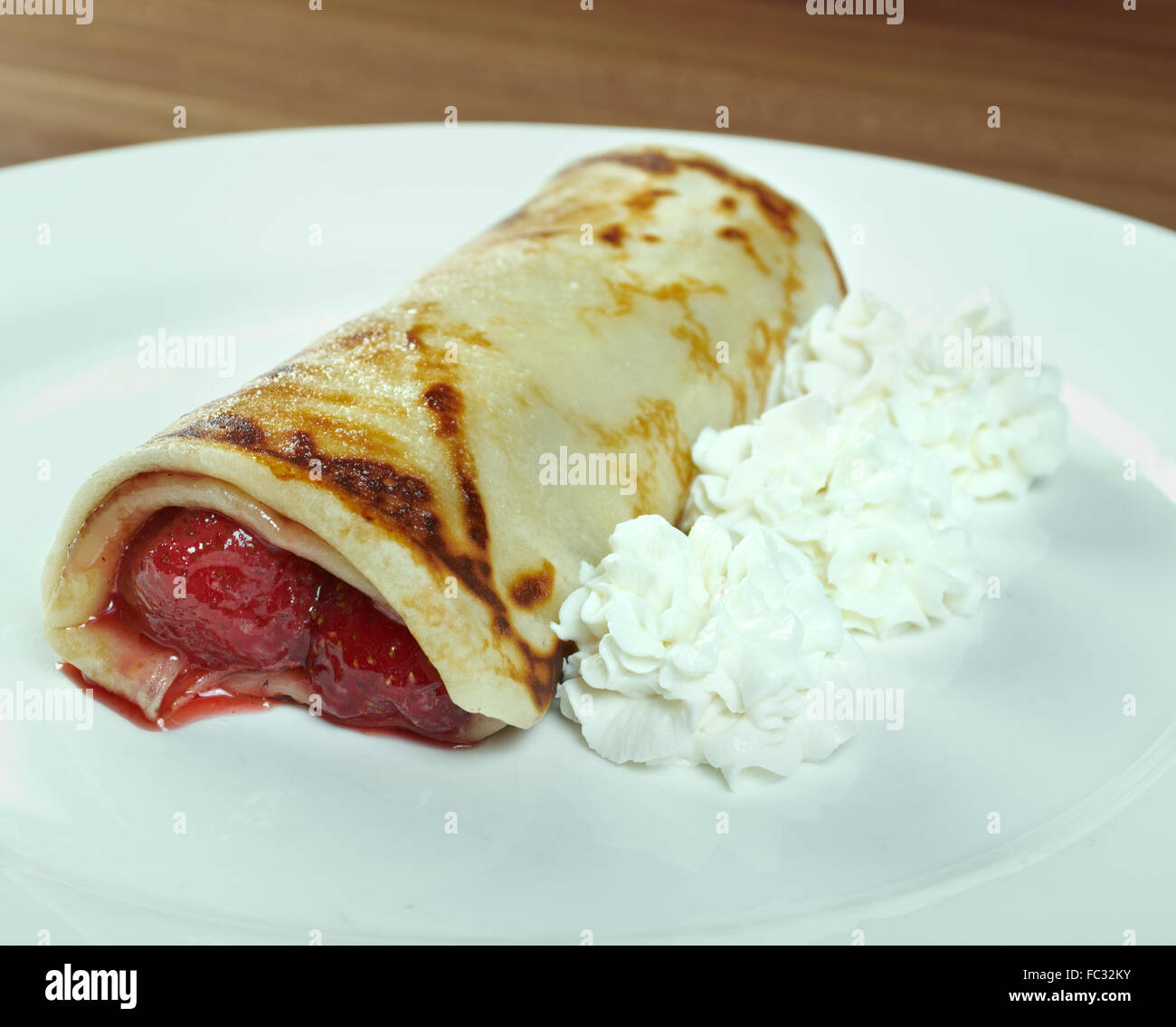 stuffed pancakes with raspberry jam Stock Photo - Alamy